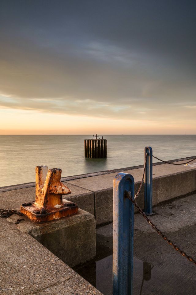 West Quay and the Dolphin at Whitstable at sunset.
